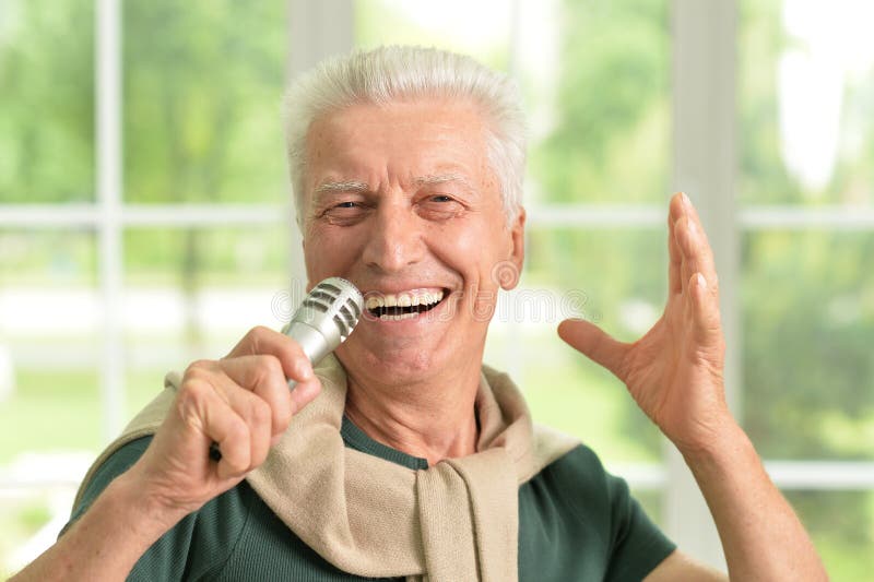 Senior Man Singing Karaoke with Tablet Stock Image - Image of male ...