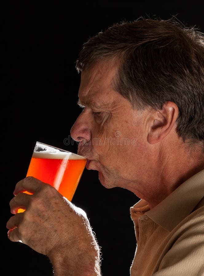 Senior Man Sipping from Pint Glass Beer Stock Image - Image of lager ...