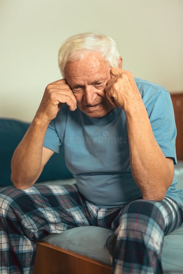 Senior Man Sitting on Bed Suffering from Depression Stock Image - Image ...
