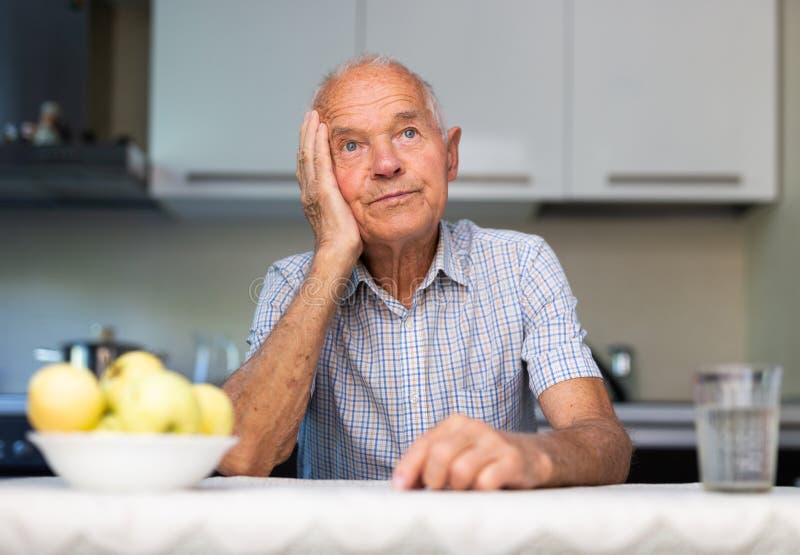 Senior Man Sitting at Table in Kitchen Stock Image - Image of french ...