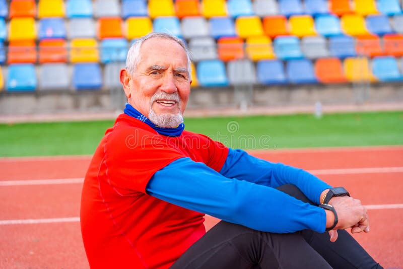 Senior Man Smiling at Camera Sitting Tired after Running Stock Photo ...