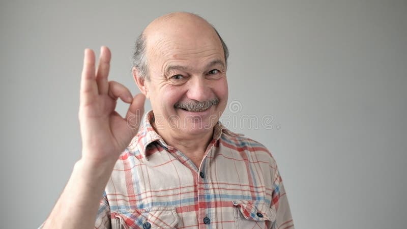 Senior Man Smiling Positive Doing Ok Sign with Hand and Fingers. Stock ...