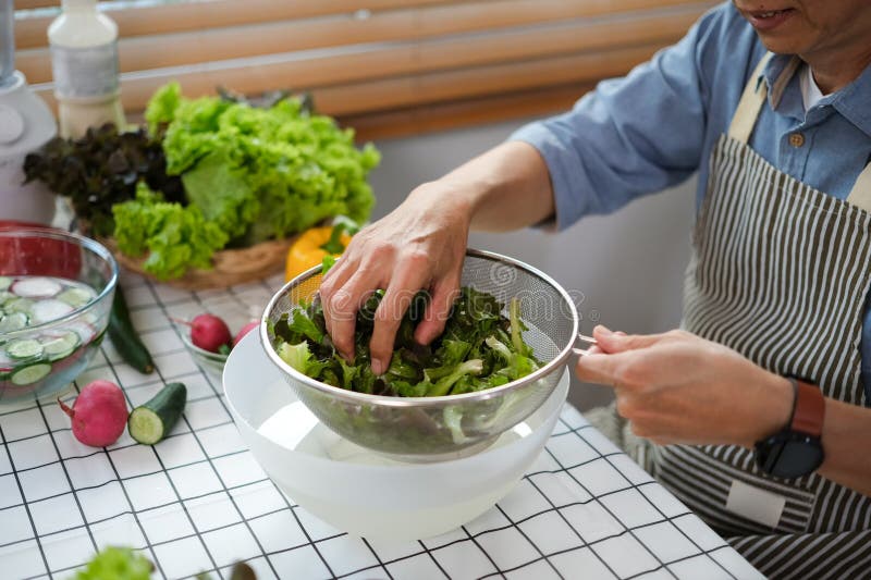 Senior Man Sorting Out Fresh Vegetables Preparing a Fresh Healthy Vegan ...