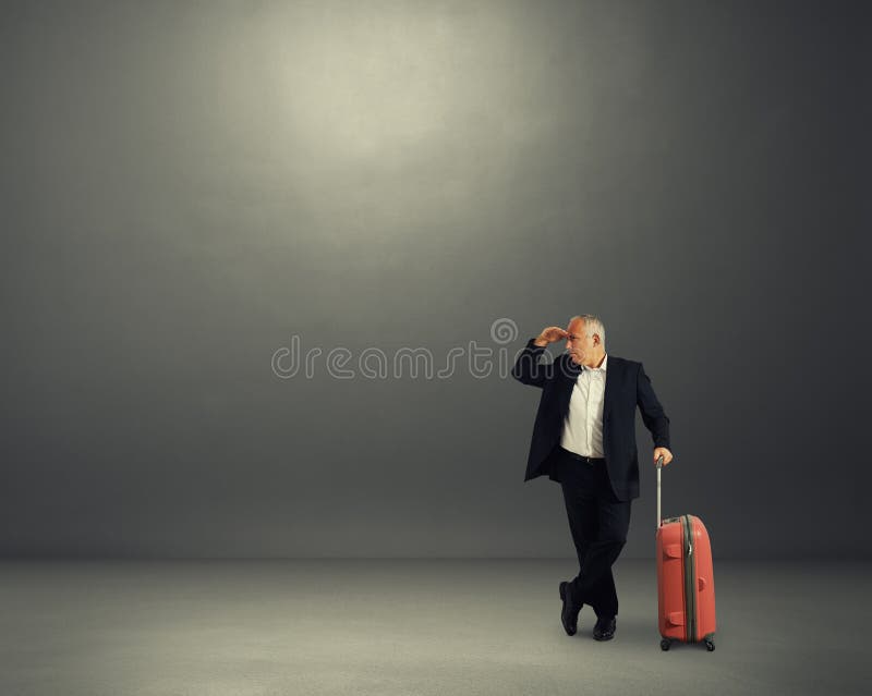 Senior Man Standing in the Dark Room Stock Photo - Image of senior ...