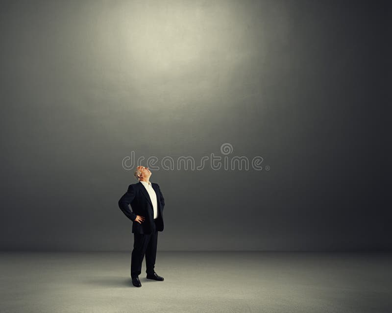 Man Standing in the Dark Grey Room Stock Photo - Image of small, floor ...