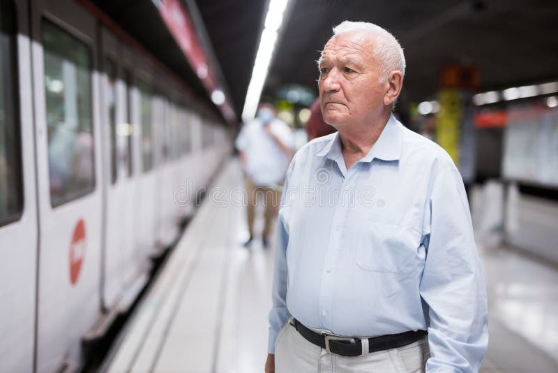 Senior Man Standing in Front of Subway Train Stock Photo - Image of ...