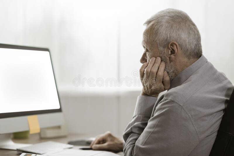 Senior Man Staring at the Computer Screen Stock Photo - Image of ...