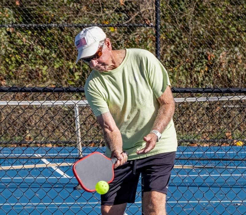 Senior Man Stays in Shape by Playing Pickleball Stock Image - Image of ...