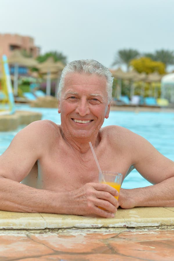Senior Man in Swimming Pool Stock Image - Image of senior, elderly ...