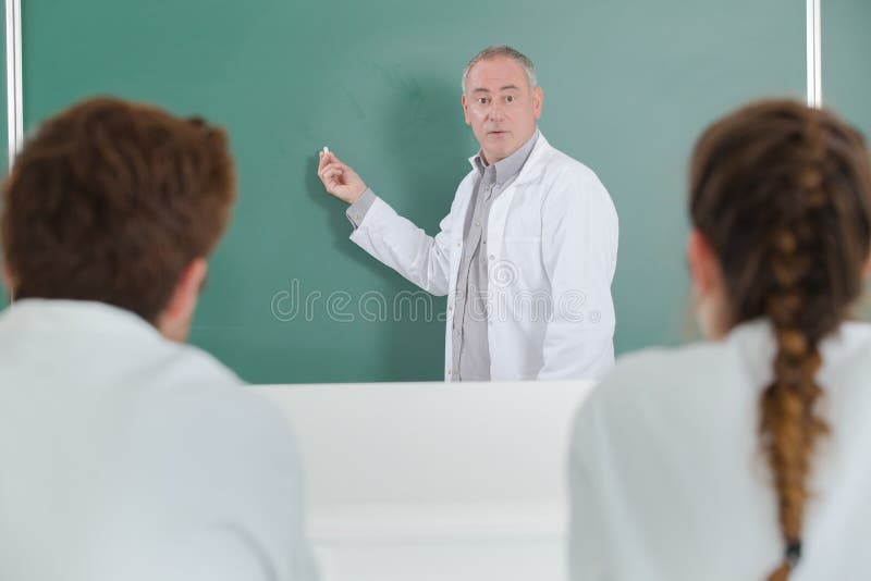 Senior Man Teacher on Green Board Stock Photo - Image of green, male ...