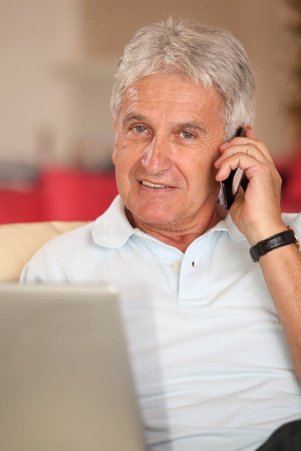 Senior man with telephone stock image. Image of active - 15453975