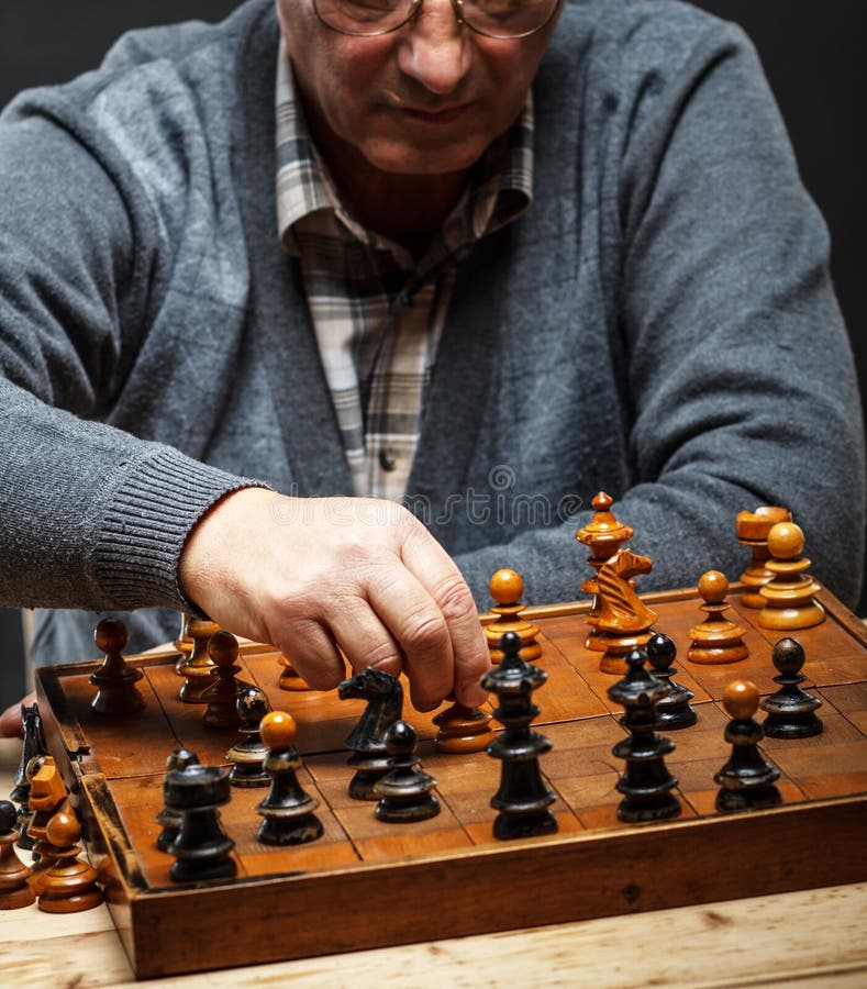 Senior Man Thinking about His Next Move in a Game of Chess Stock Image ...