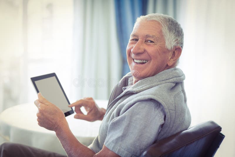 Senior Man Using Digital Tablet Stock Photo - Image of cheerful, hair ... Senior Man Using Digital Tablet Stock Photo - Image of cheerful, hair ...