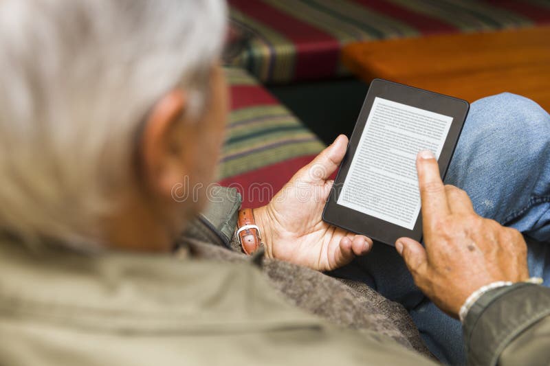 Senior Man Using an Ebook Reader Stock Image - Image of break, indoor ...