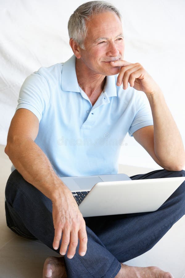 Senior Man Using Laptop Computer Stock Photo - Image of wireless ...
