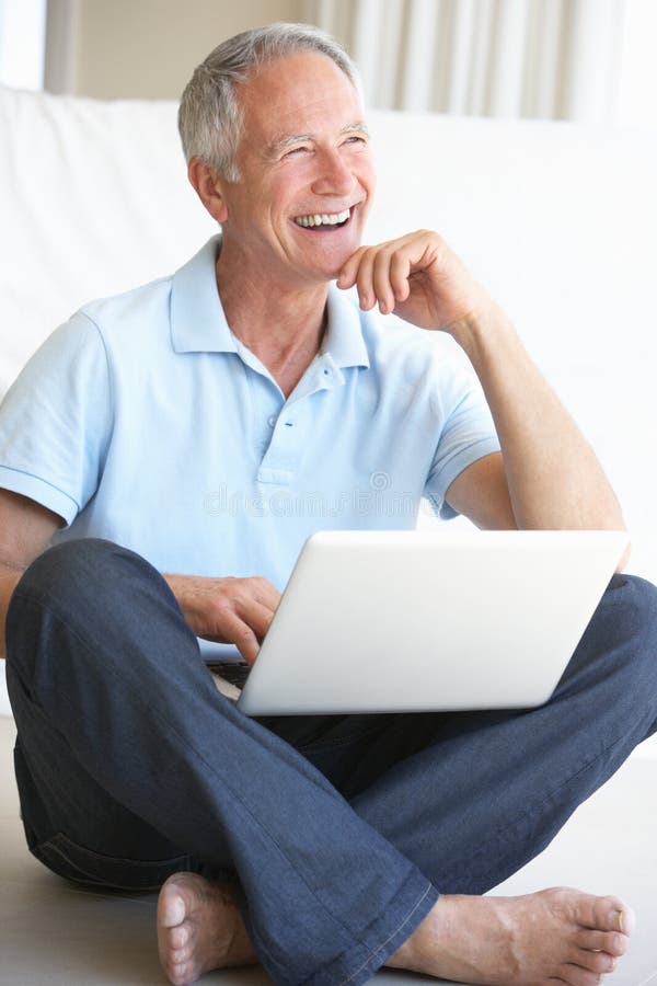 Senior Man Using Laptop Computer Stock Image - Image of sixties, laptop ...