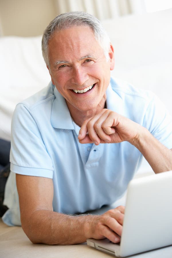 Senior Man Using Laptop Computer Stock Image - Image of seventies ...