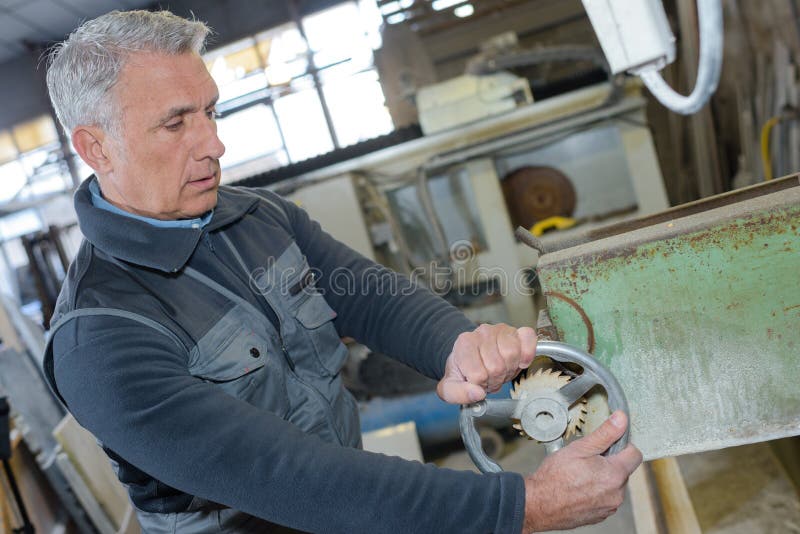Senior Man Using Milling Machine Stock Photo - Image of equipment ...