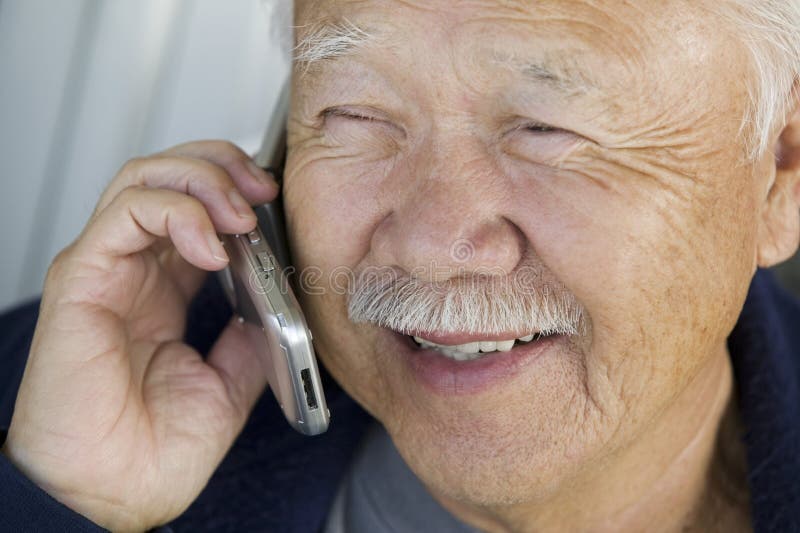 Senior man with cell phone stock image. Image of phone - 40203933