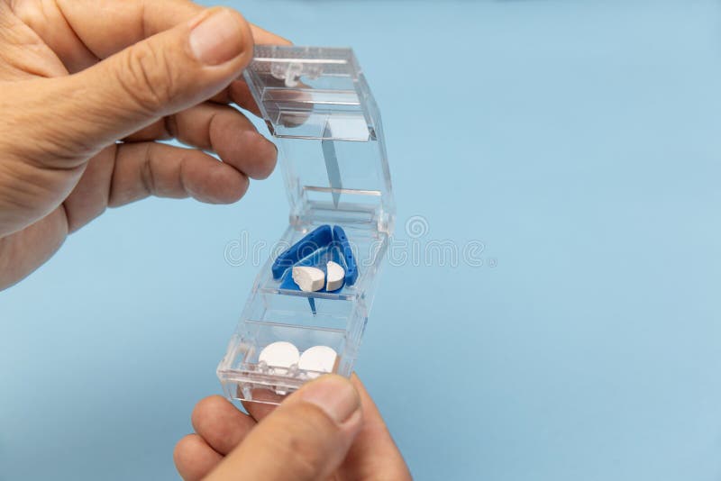 Senior Man Using Pill Splitter Cutter Stock Photos - Free & Royalty ...