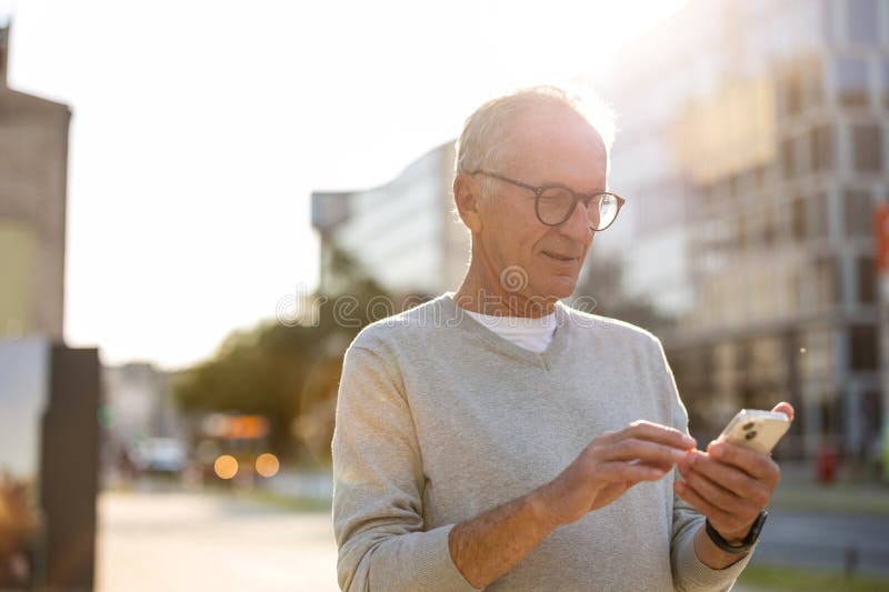 Senior Man Using Smartphone in the City Stock Image - Image of outdoors ...