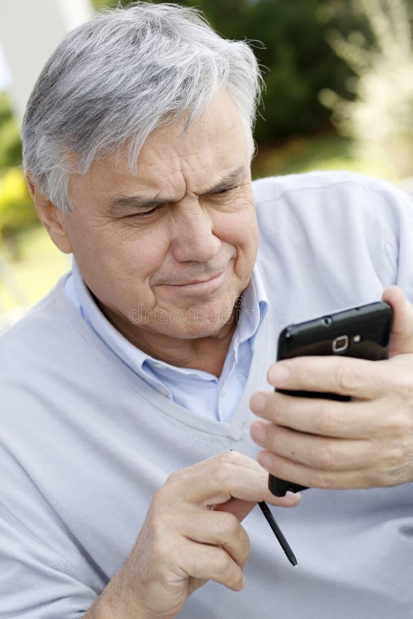 Senior Man Using Smartphone Stock Image - Image of handsome ...