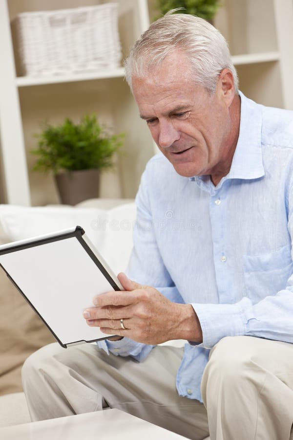 Senior Caucasian Man in Glasses with Tablet Computer Stock Photo ...