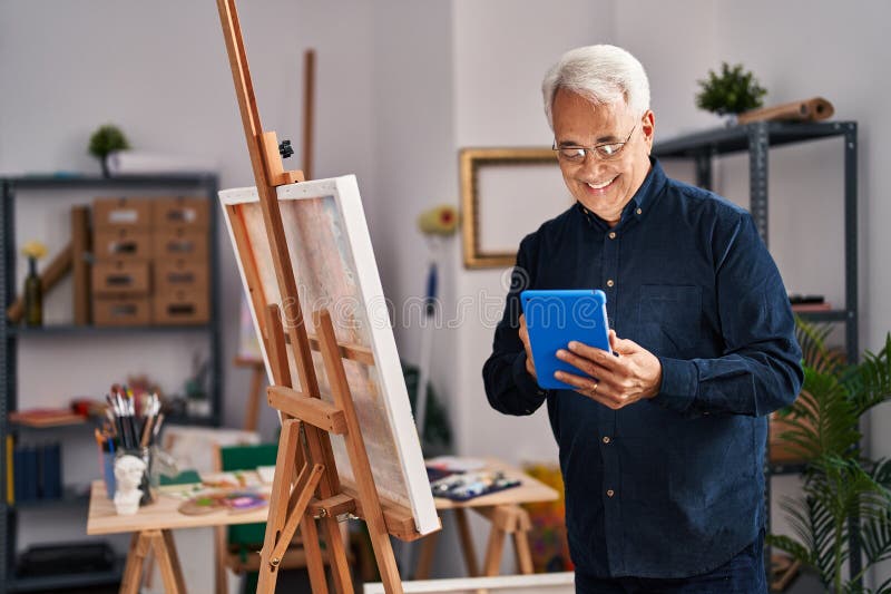 Senior Man Using Touchpad Drawing at Art Studio Stock Photo - Image of ...