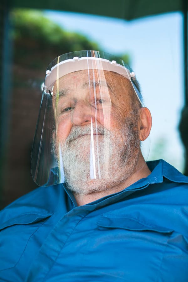 Senior Man Wearing a Protective Visor and Santa Claus Suit Stock Image ...