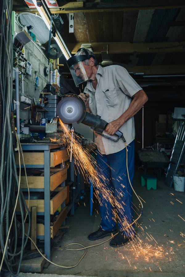 Senior Man Working with Angle Grinder Stock Image - Image of repair ...