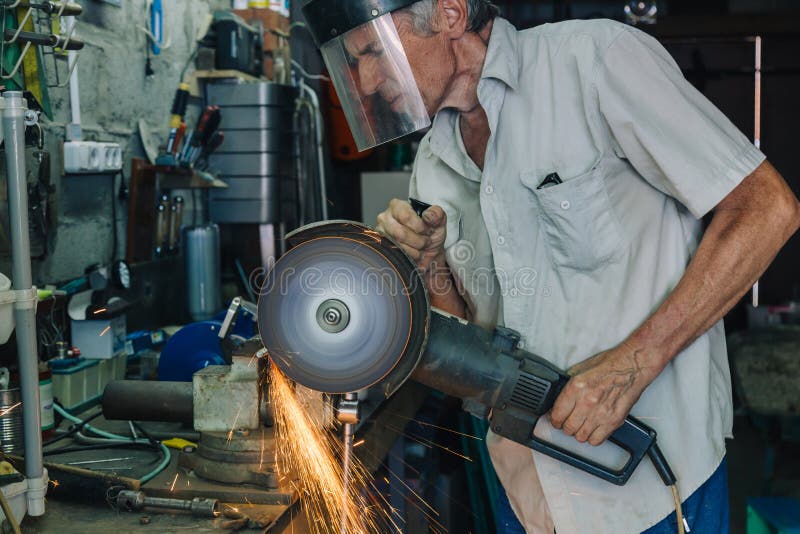 Senior Man Working Angle Grinder Stock Photos - Free & Royalty-Free ...
