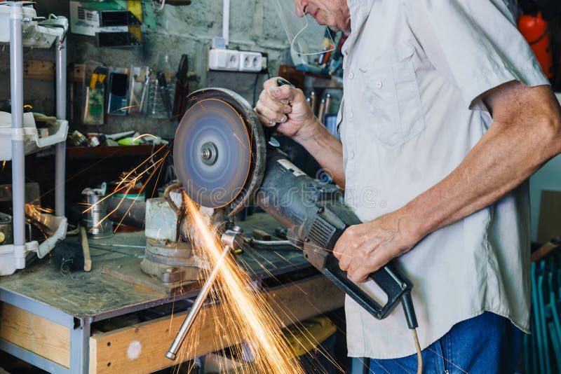 Senior Man Working with Angle Grinder Stock Image - Image of ...