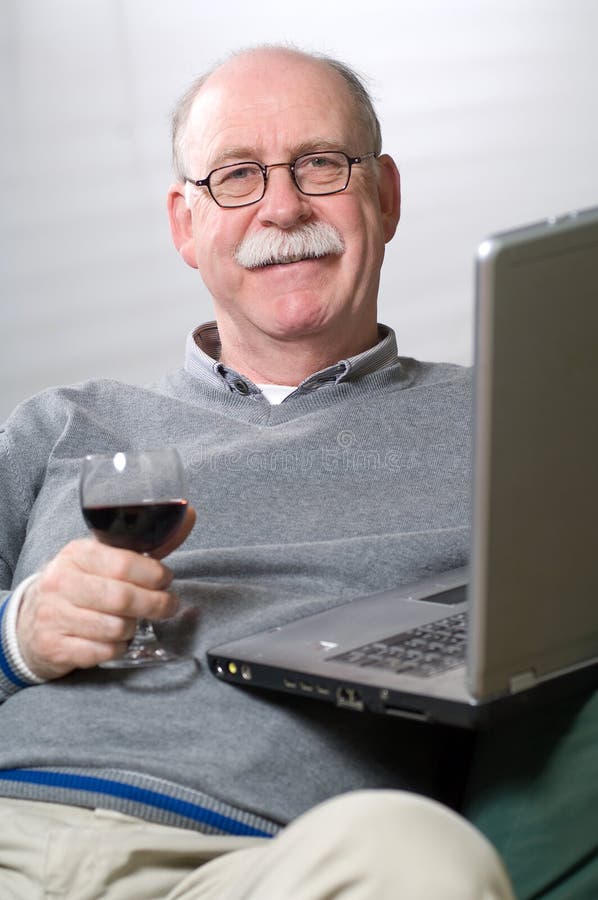 Portrait of Happy Senior Man with Computer Stock Photo - Image of desk ...