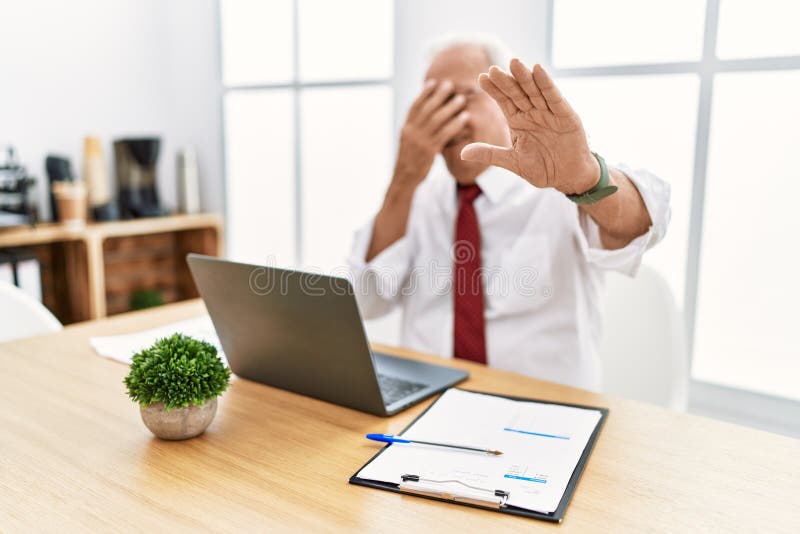 Senior Man Working at the Office Using Computer Laptop Covering Eyes ...