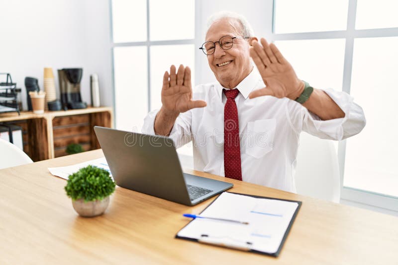 Senior Man Working at the Office Using Computer Laptop Doing Frame ...