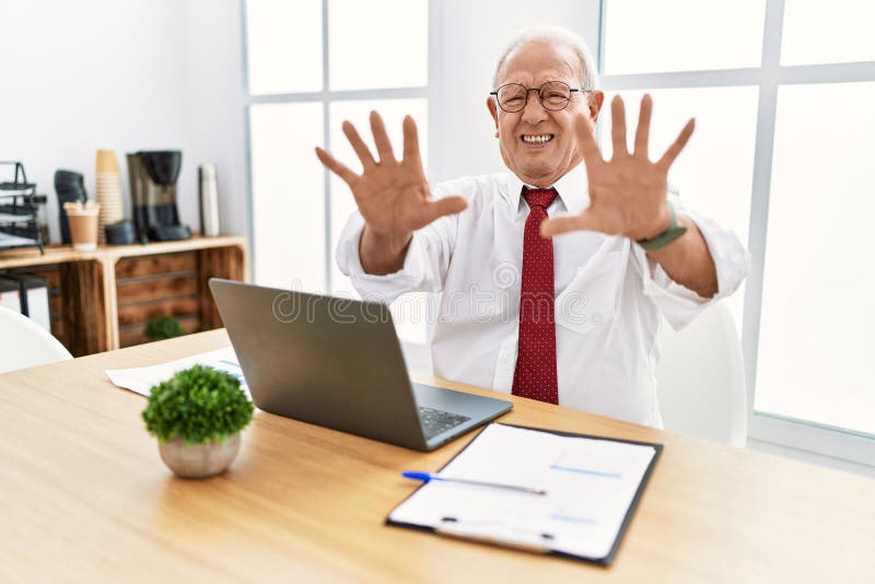 Senior Man Working at the Office Using Computer Laptop Doing Stop ...