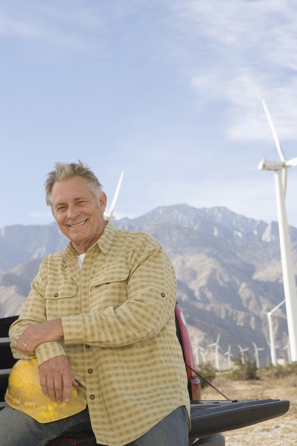 Senior Man Working at Wind Farm Stock Photo - Image of looking, senior ...