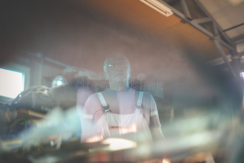 Senior Man in Workshop. Man Poses in Workshop Stock Photo - Image of ...