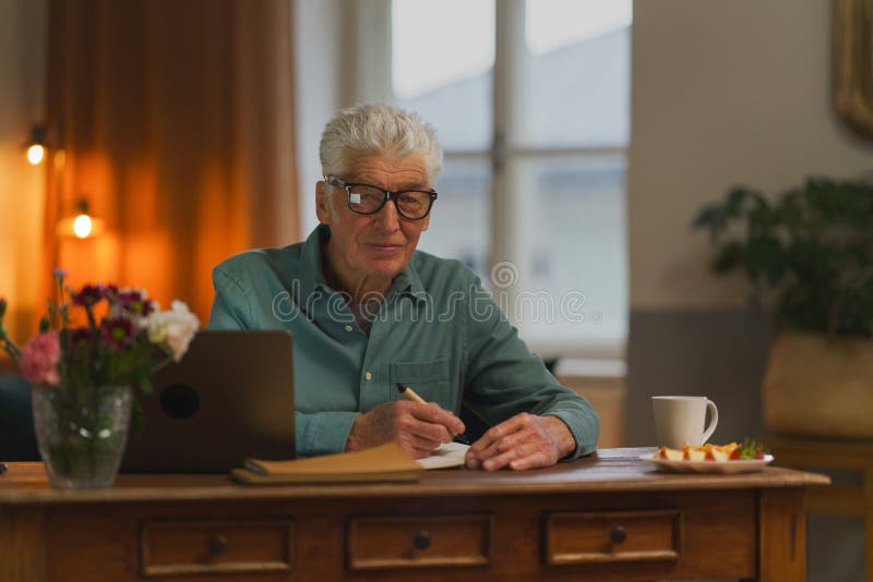 Senior Man Writing Notes in His Diary. Stock Photo - Image of pension ...