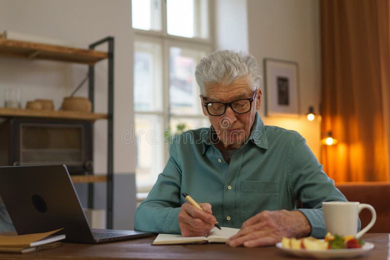 Senior Man Writing Notes in His Diary. Stock Image - Image of senior ...