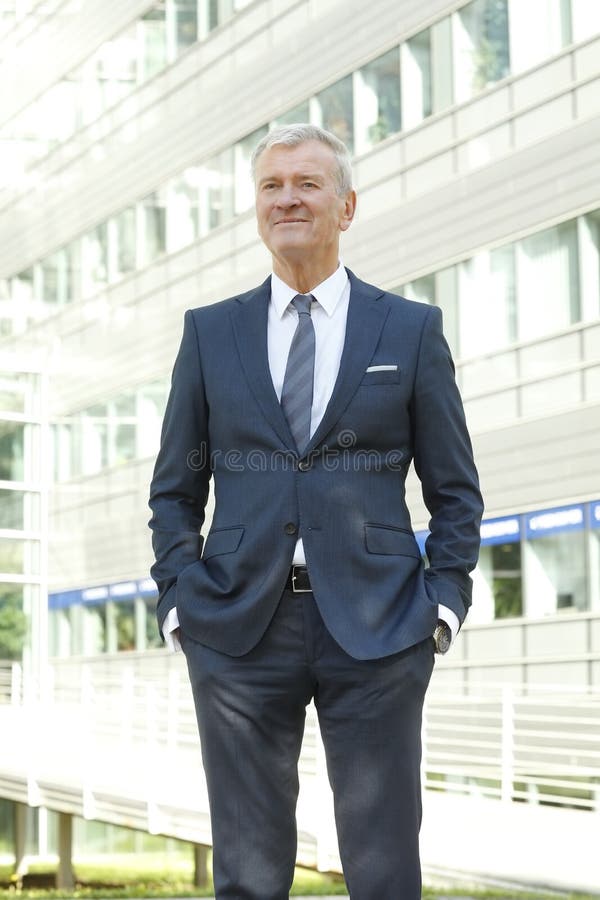 Senior manager portrait stock image. Image of standing - 61853609