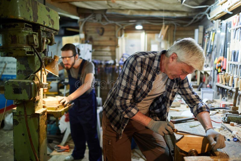 Masters in workshop stock image. Image of adult, artisan - 120793491