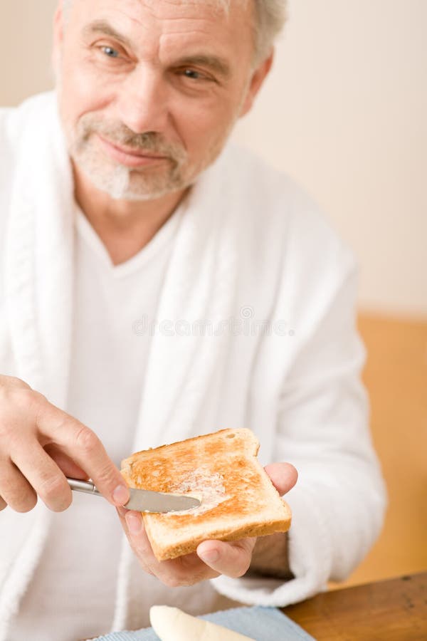 Senior Mature Man Having Breakfast Toast Stock Photo - Image of food ...