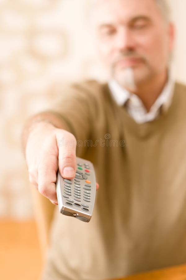Senior Mature Man with Remote Control Stock Photo - Image of retirement ...