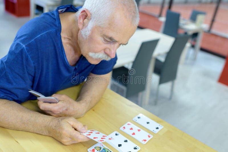 Senior Men Playing Cards Outdoors Stock Image - Image of 7579years ...