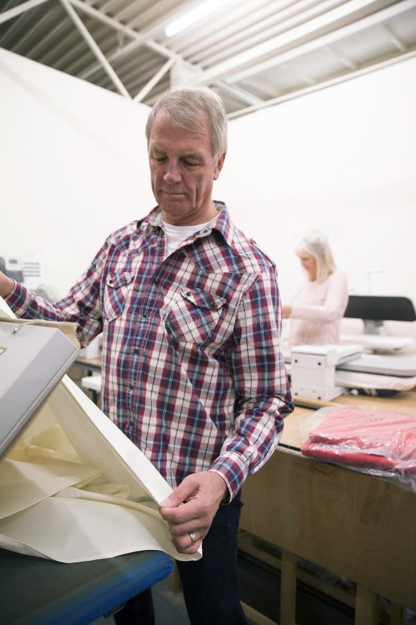 Pressing Material in a Fabric Warehouse Stock Image - Image of fashion ...