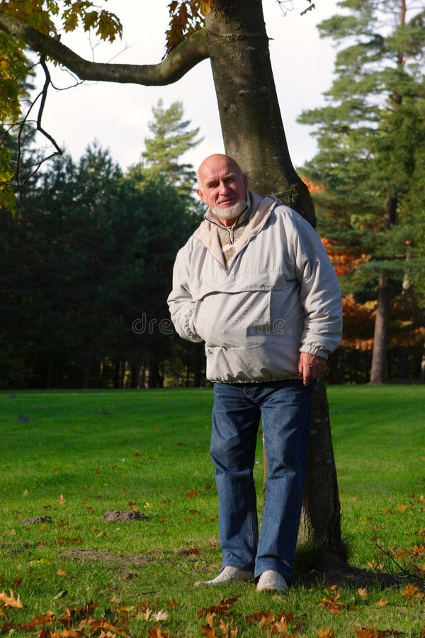 Senior Men Standing Near Tree Stock Image - Image of happiness, older ...