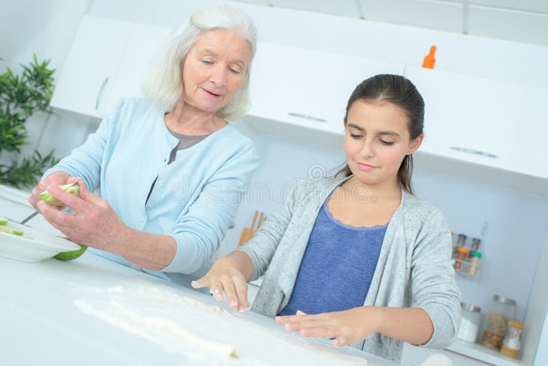 Senior Nanny Cooking with Child Stock Image - Image of nanny, cheese ...