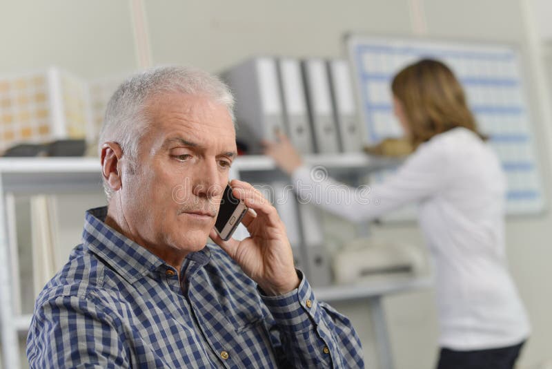 Senior Office Worker on Phone Stock Photo - Image of adult ...