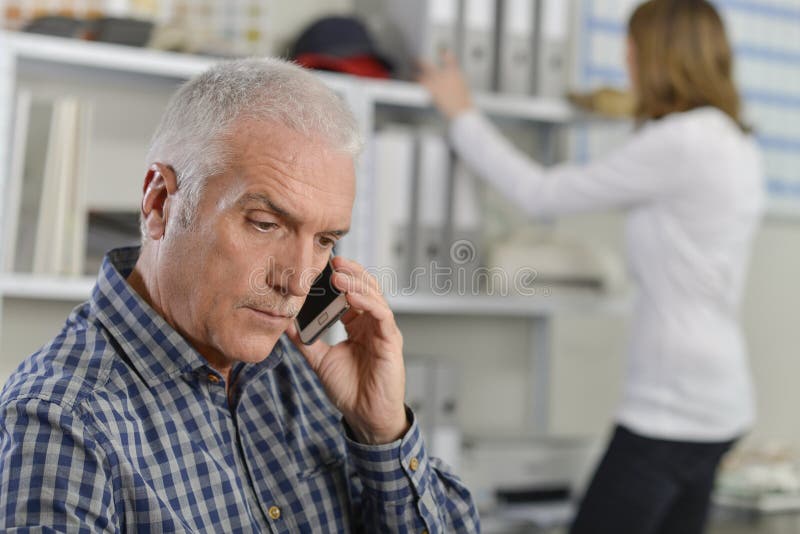 Senior Office Worker Taking Important Call Stock Image - Image of light ...